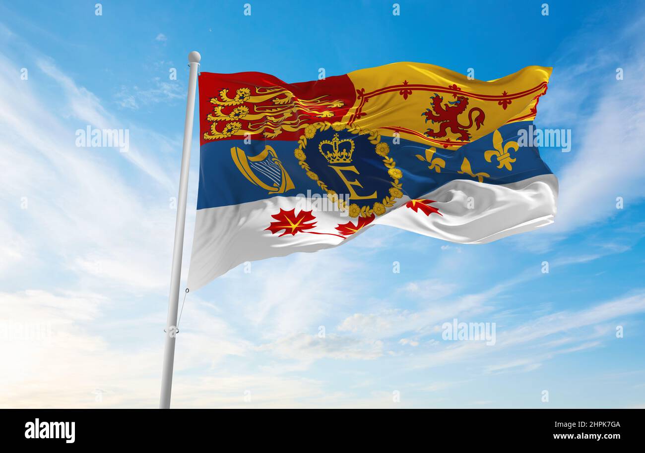 flag of Royal Standard of Canada , Canada at cloudy sky background on ...