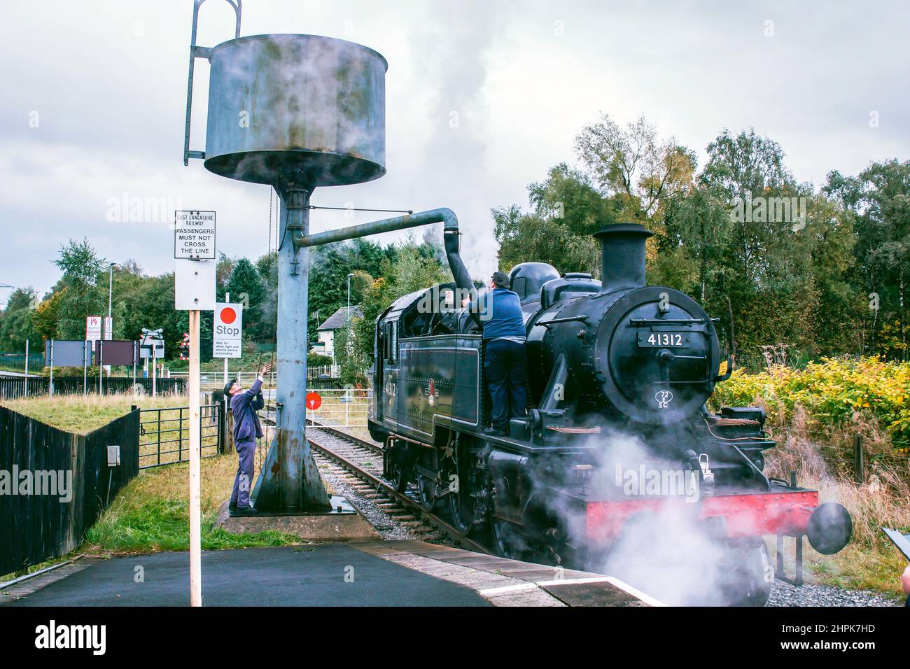 LMS Ivatt Class 2 2-6-2T 41312 filling up with water at Bury station on ...