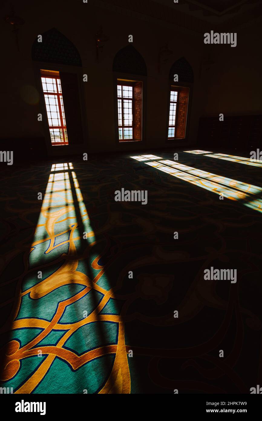 Islamic background. Shadows of window on the carpet in a mosque ...