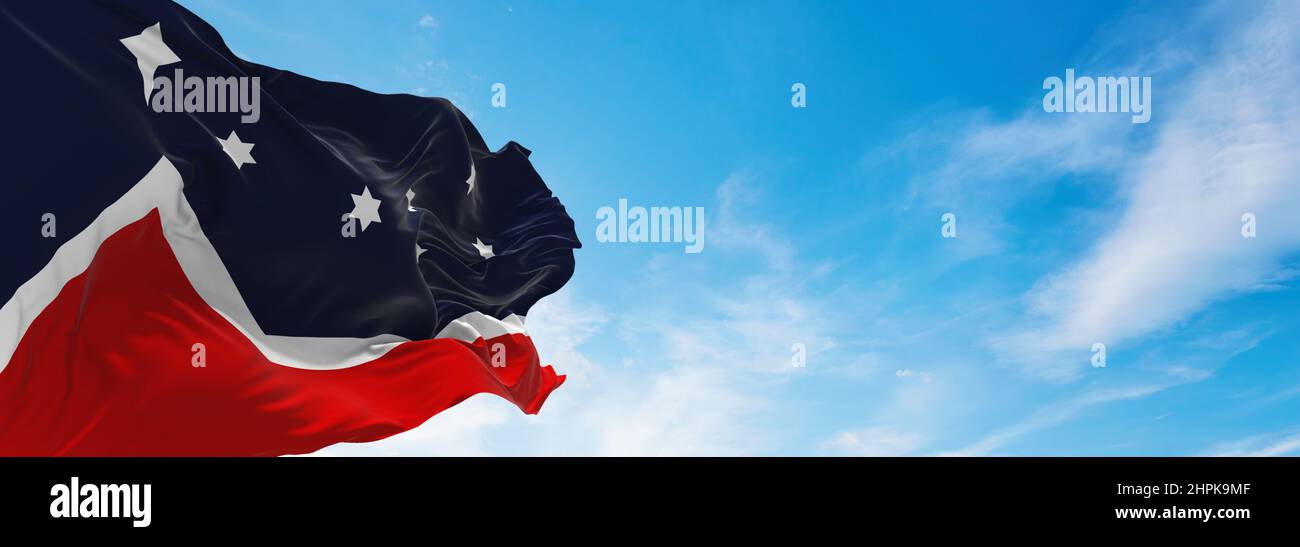 flag of Western Canada , Canada at cloudy sky background on sunset ...