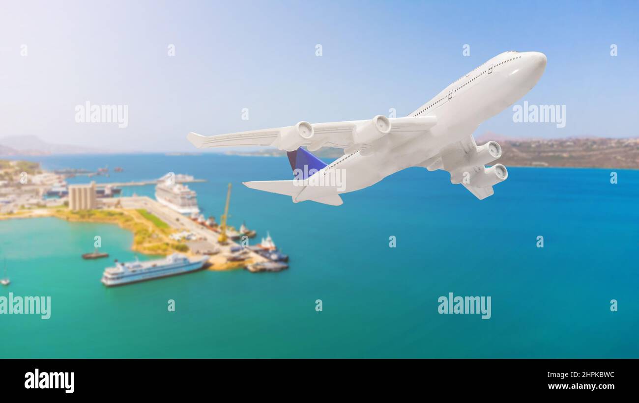 Aerial top down view of an airplane flying over blue sea as a travel ...