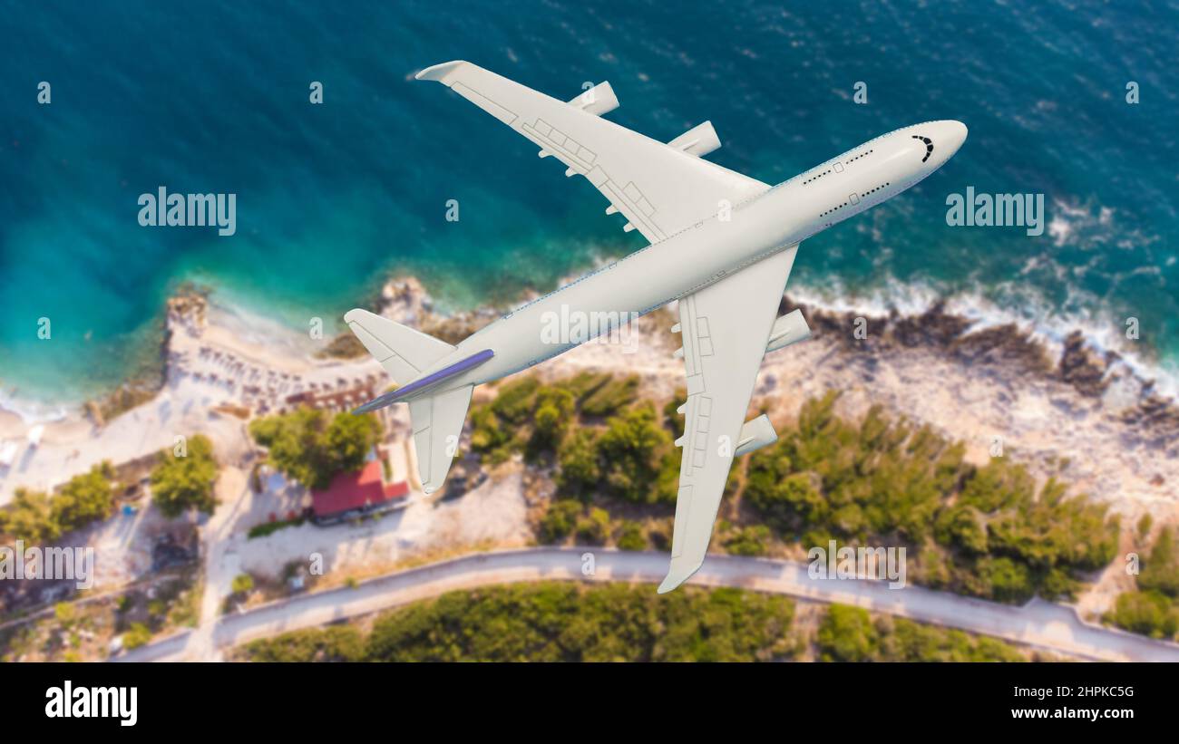 Airplane landing above beautiful beach and sea background Stock Photo ...