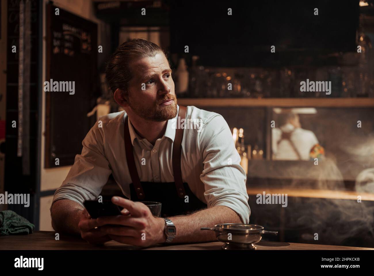 Sitting reading uniform concentration hi-res stock photography and ...