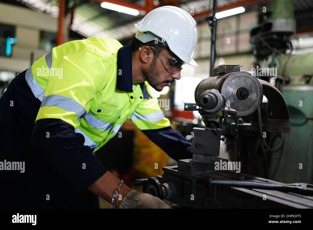 Factory Engineer Operating machines in industry factory Stock Photo - Alamy