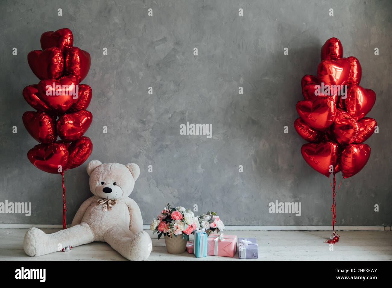 lots of festive red birthday balloons holliday Stock Photo - Alamy