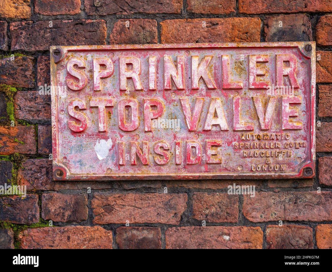 old weathered iron sign, 'Sprinkler stop valve inside' Stock Photo - Alamy