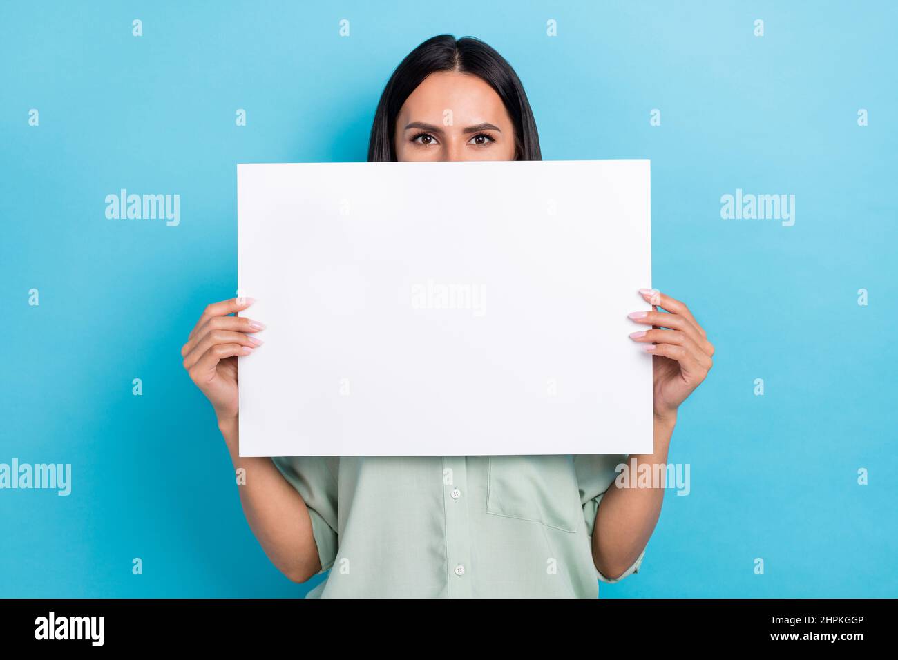 Photo of young woman cover mouth paper banner advertising promoter ...