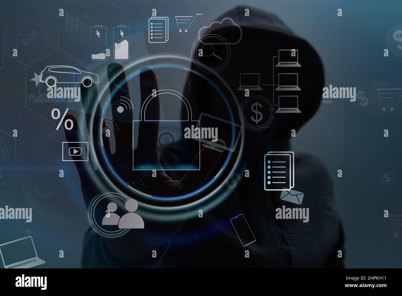 Studio portrait of a man in a hood, a shadow hides his face. Anonymity ...