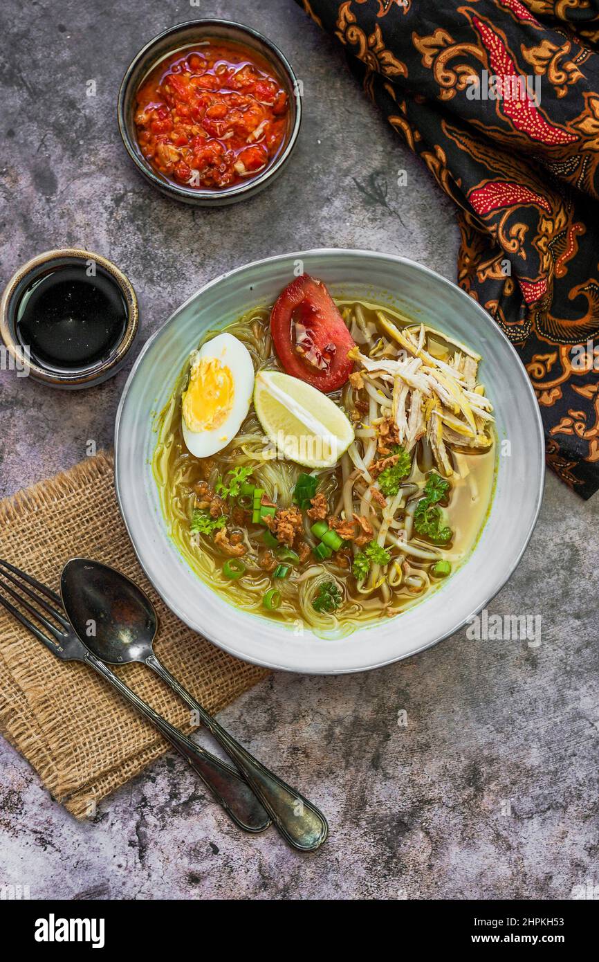 Soto is a traditional Indonesian soup mainly composed of broth, chicken ...