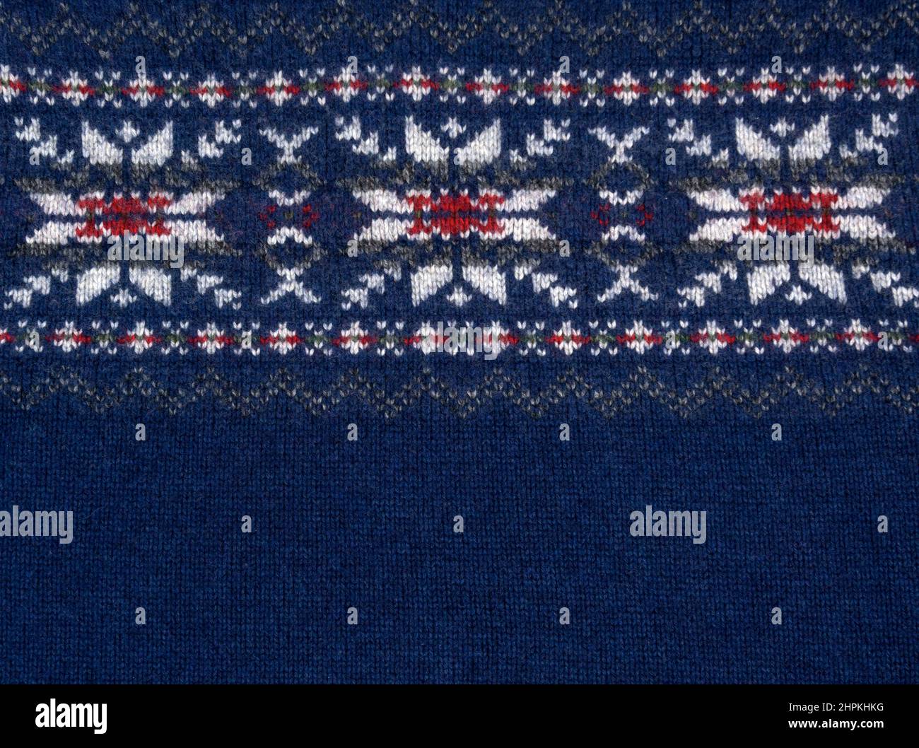 Texture of knitted fabric with ethno pattern Stock Photo - Alamy