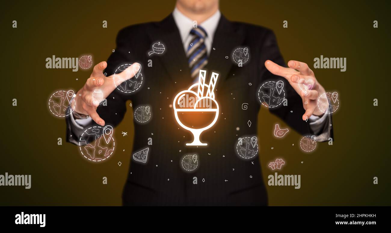 Hand holding food related icons Stock Photo - Alamy