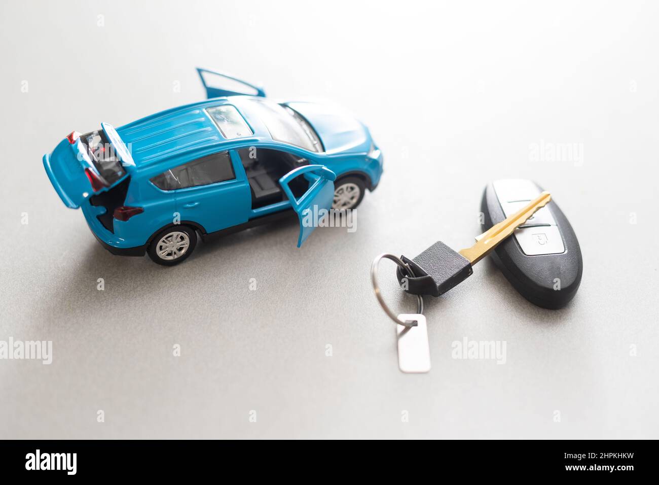 Toy car and keys isolated on white background Stock Photo - Alamy