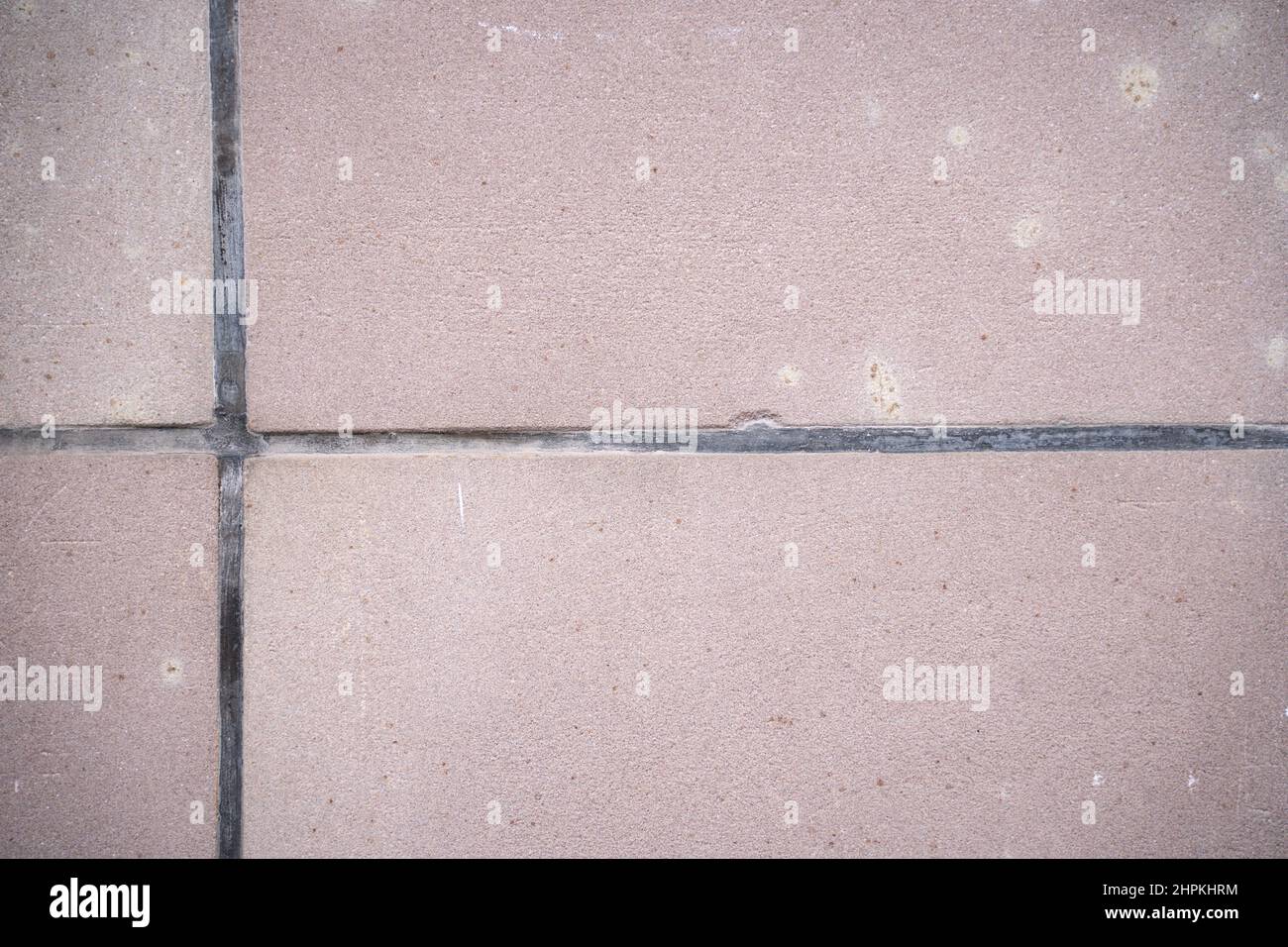 big pink cement tiles with gray seam Stock Photo - Alamy