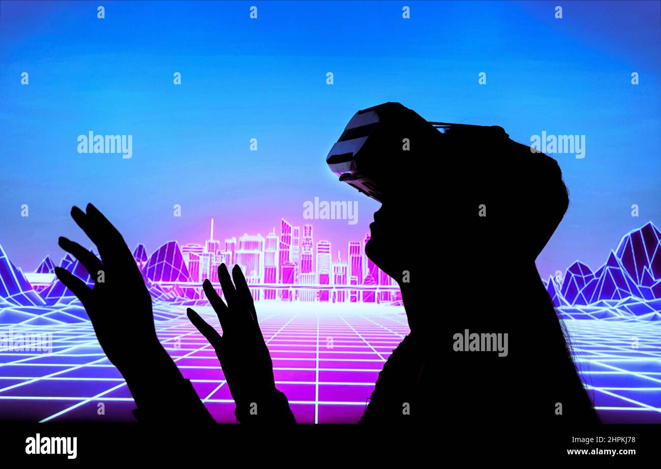 the silhouette of Female person using Virtual reality headset in ...
