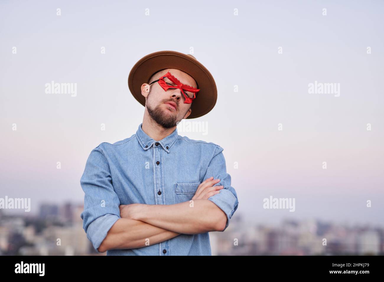 Man with red cape hi-res stock photography and images - Alamy