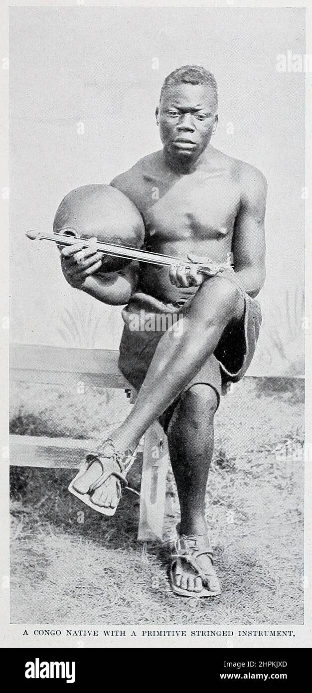 A CONGO NATIVE WITH A PRIMITIVE STRINGED INSTRUMENT from the book ' The ...