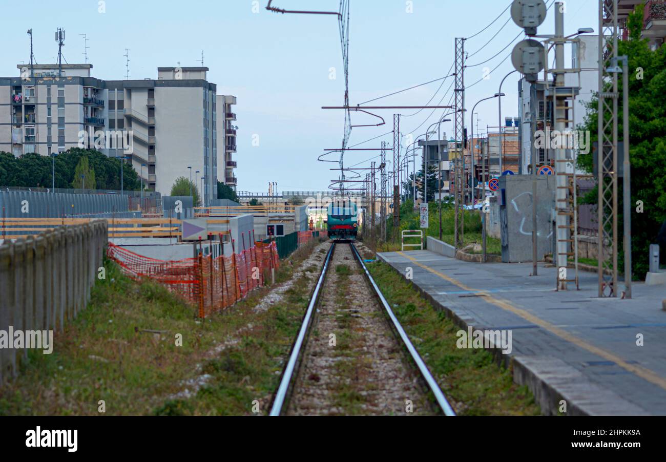 Image of an empty railroad track going to far away and train in the ...