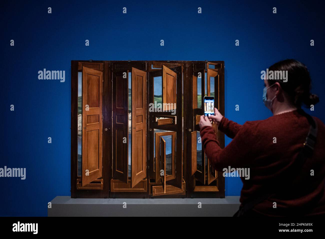 London, UK. 22nd Feb, 2022. A visitor views "Surrealist Wardrobe", 1941 ...