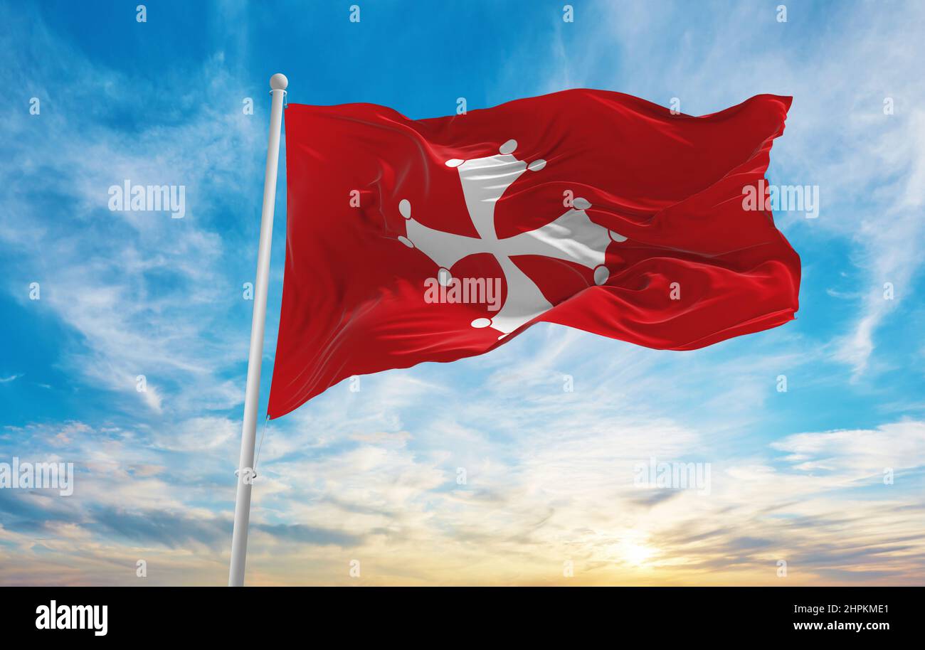 flag of the Republic of Pisa, Italy at cloudy sky background on sunset ...