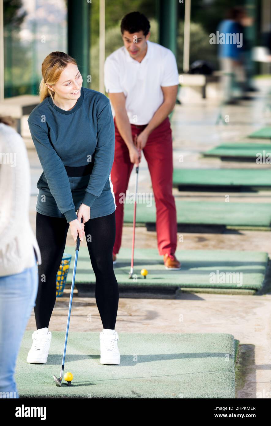 Golf partners playing together Stock Photo - Alamy