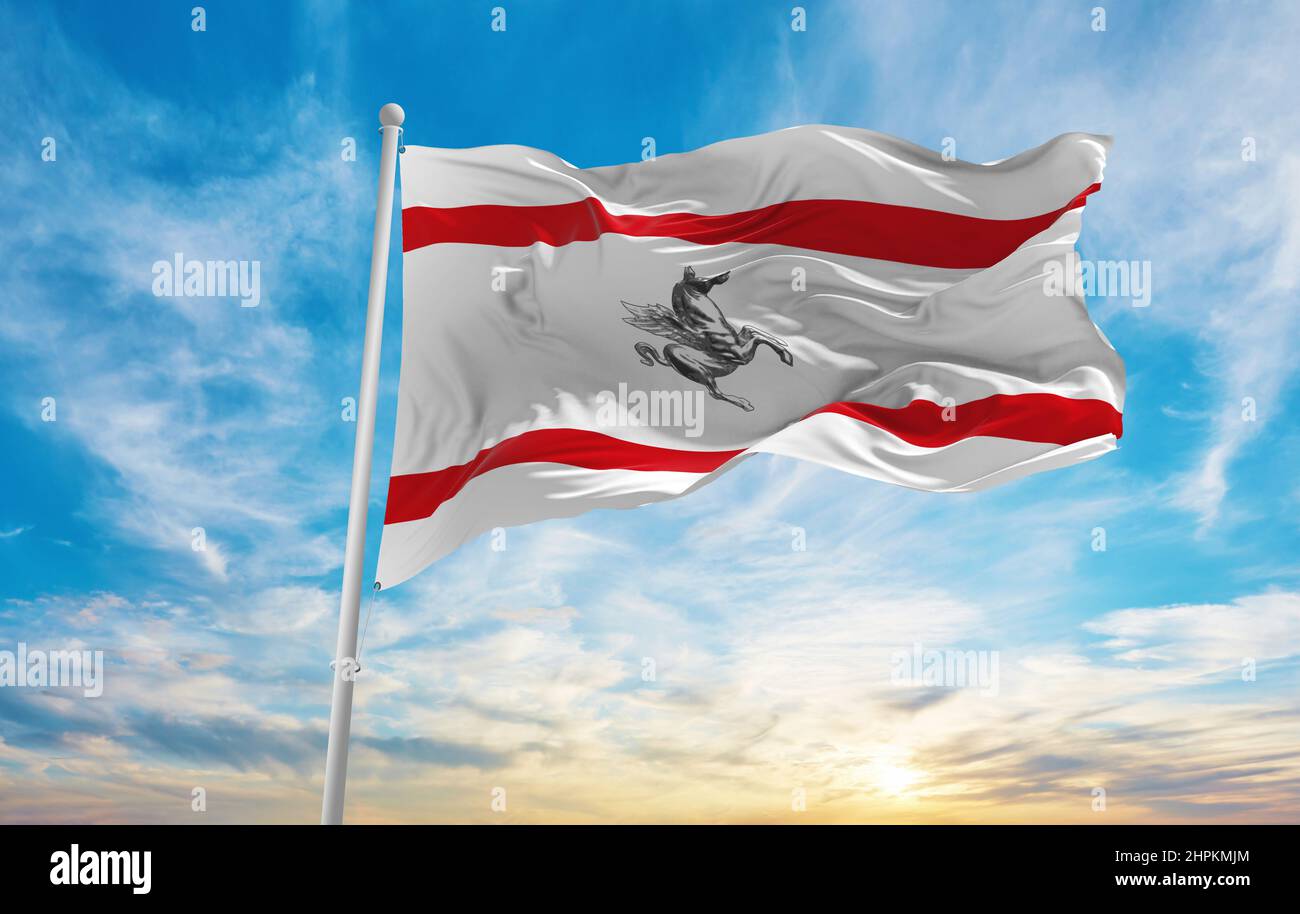 flag of Tuscany, Italy at cloudy sky background on sunset, panoramic ...