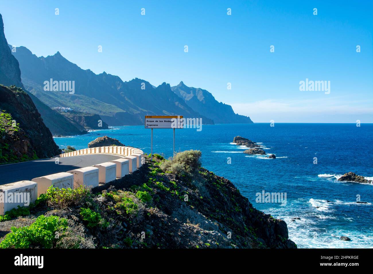 Coatal road near Playa del Roque de las Bodegas and blue Atlantic ocean ...