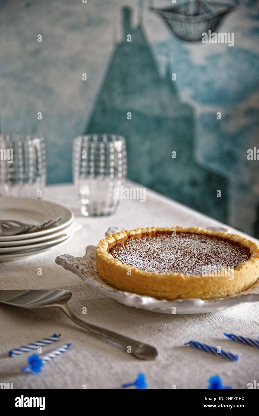 Homemade pastry cake with choco cream and icing sugar in a birthday ...