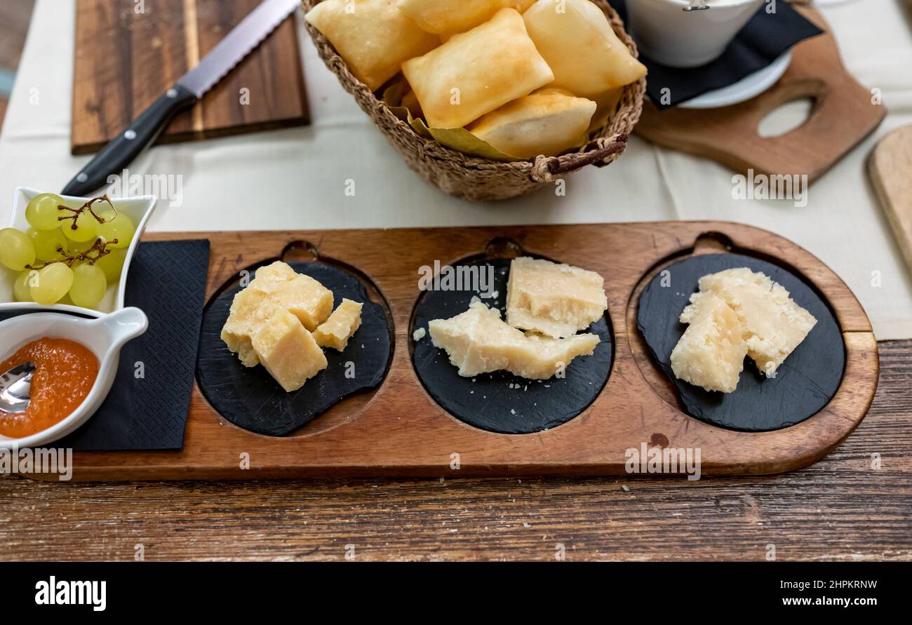 Tasting of different matured and very old parmesan Italian Parmigiano ...