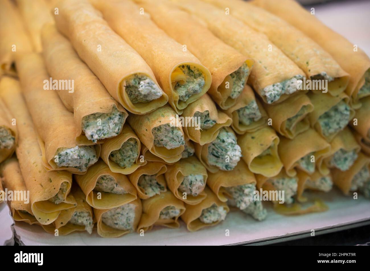 Italian food, fresh home made stuffed pancakes with ricotta cheese and ...