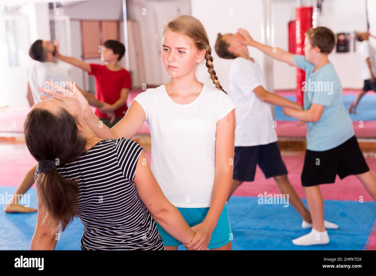Kids exercising self-defense movements Stock Photo - Alamy
