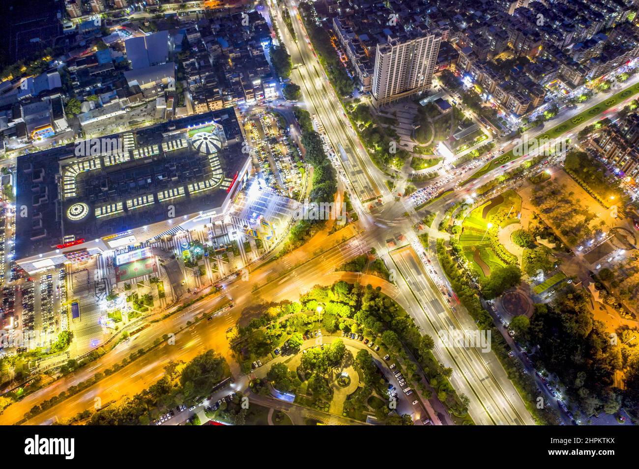 Jiangmen xinhui city skyline business circle at night Stock Photo - Alamy