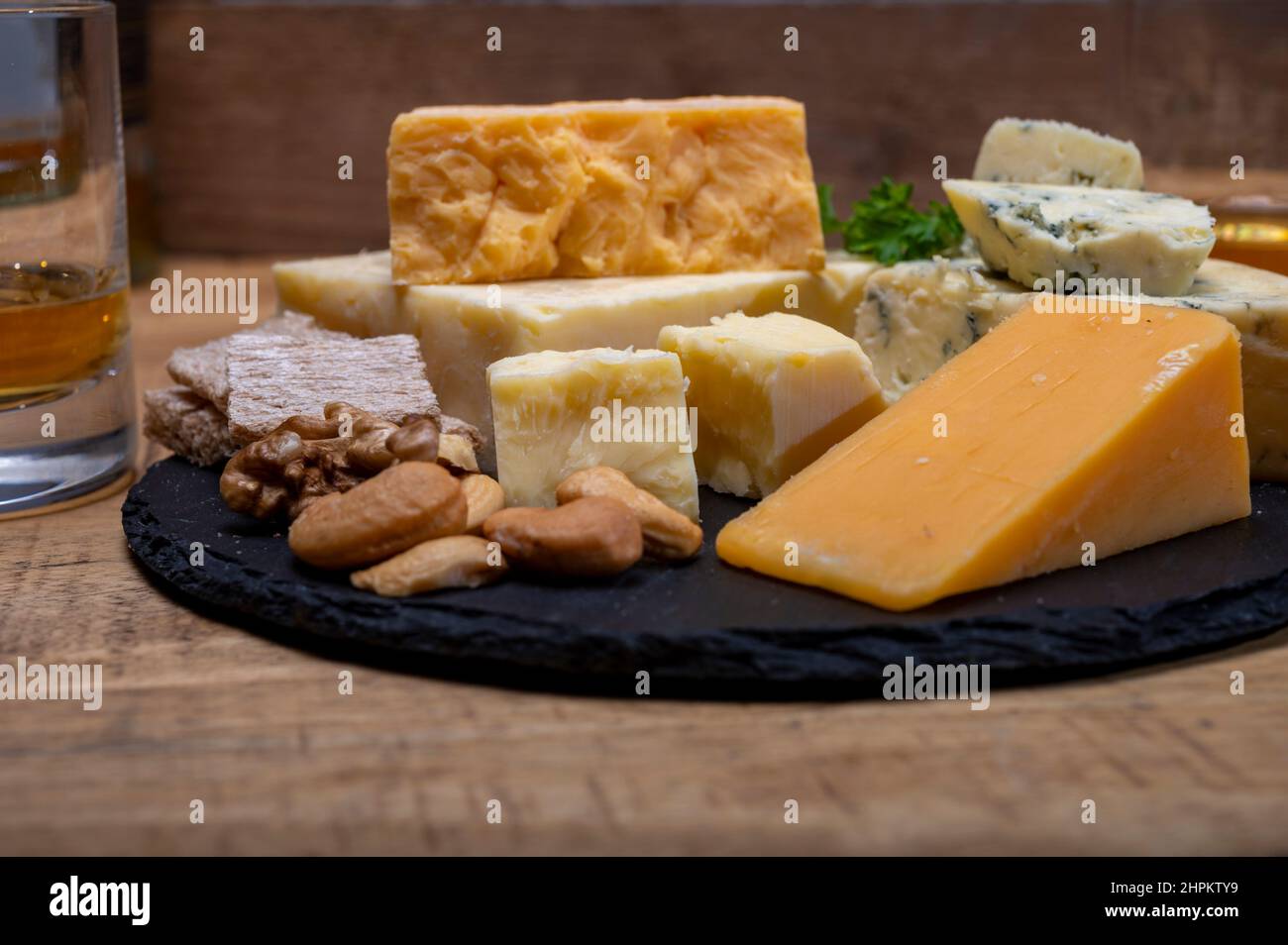 British drinks and food pairing, glasses of Scotch whisky and cheeses ...