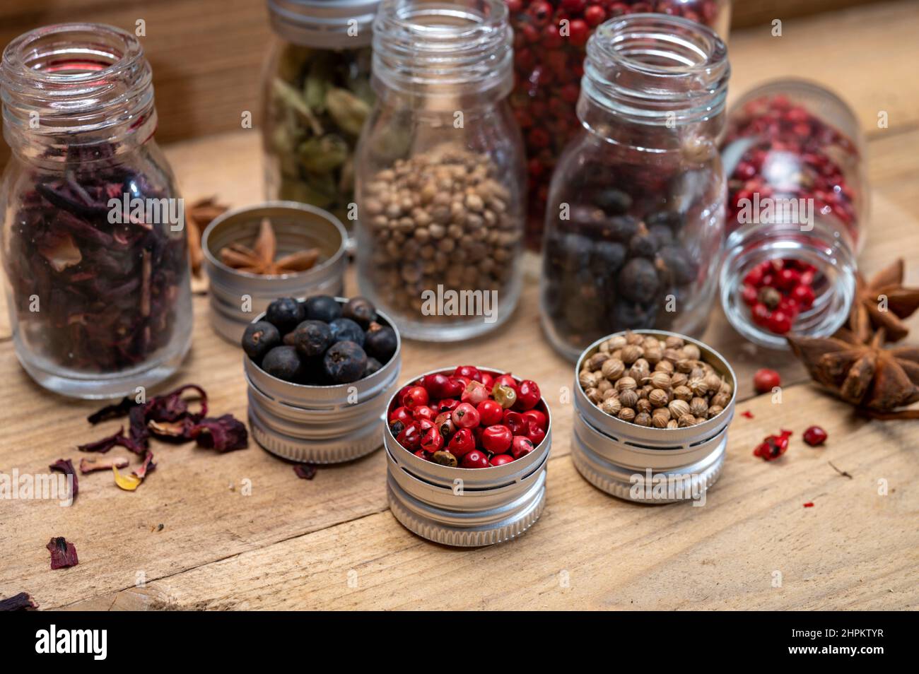 Professional set of gin spices in small bottles, pink pepper, hibiscus ...