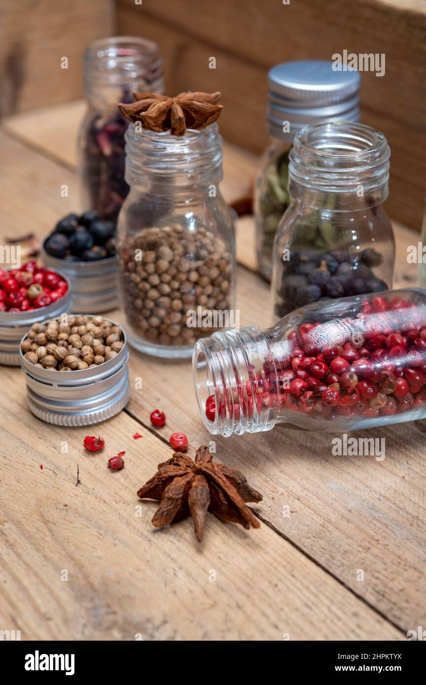 Professional set of gin spices in small bottles, pink pepper, hibiscus ...