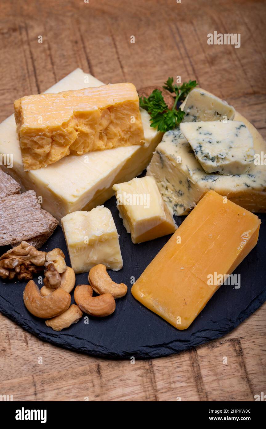British cheeses collection, blue Stilton, Scottish coloured and English ...