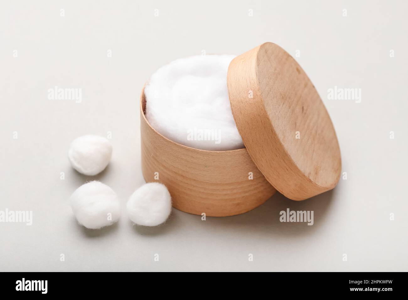 Wooden box with soft cotton wool on white background Stock Photo - Alamy