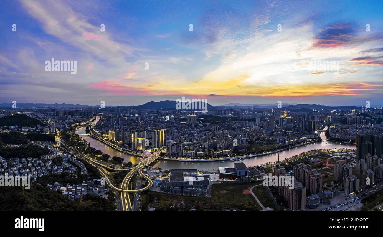 River bridge in downtown jiangmen city skyline at night Stock Photo - Alamy