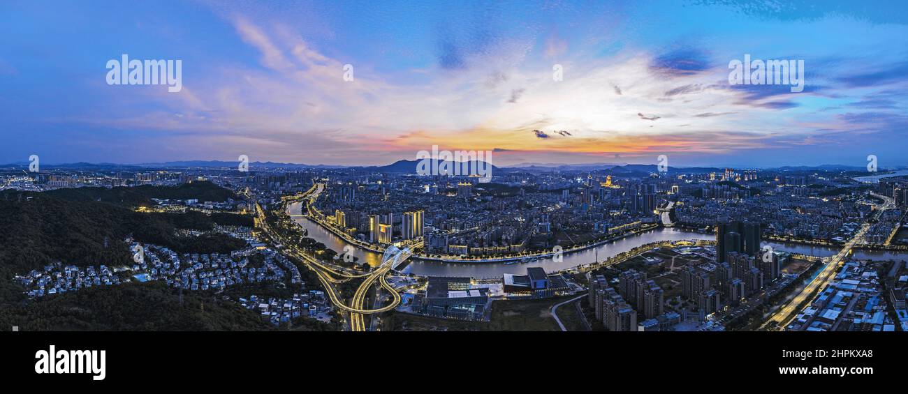 River bridge in downtown jiangmen city skyline at night Stock Photo - Alamy