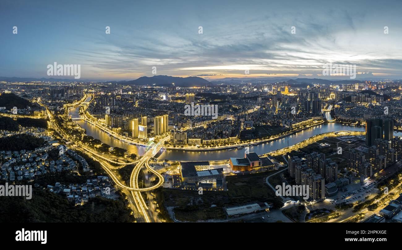 River bridge in downtown jiangmen city skyline at night Stock Photo - Alamy