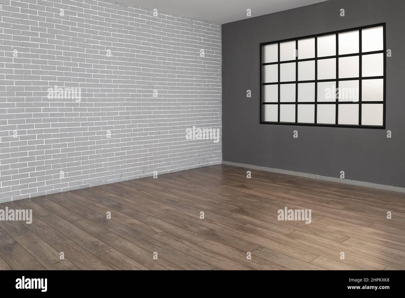 View of big empty room with window Stock Photo - Alamy