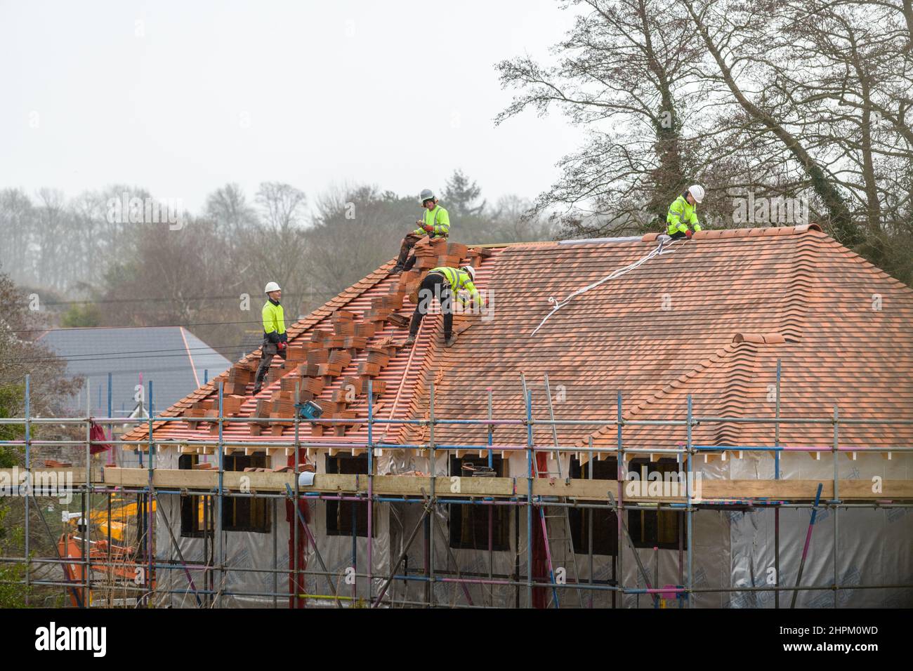 Working on roof Stock Photo - Alamy