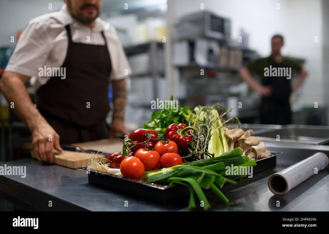 Fresh ripe vegetables prepared for cutting in commercial kitchen Stock ...