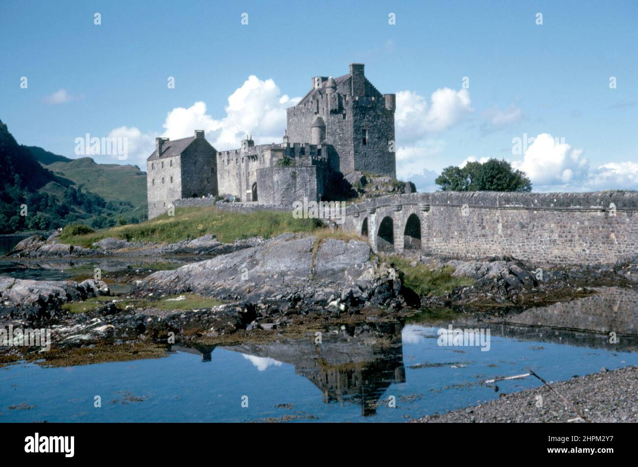 Eilean Donan Castle, 13th century Scottish castle with bright blue sky ...