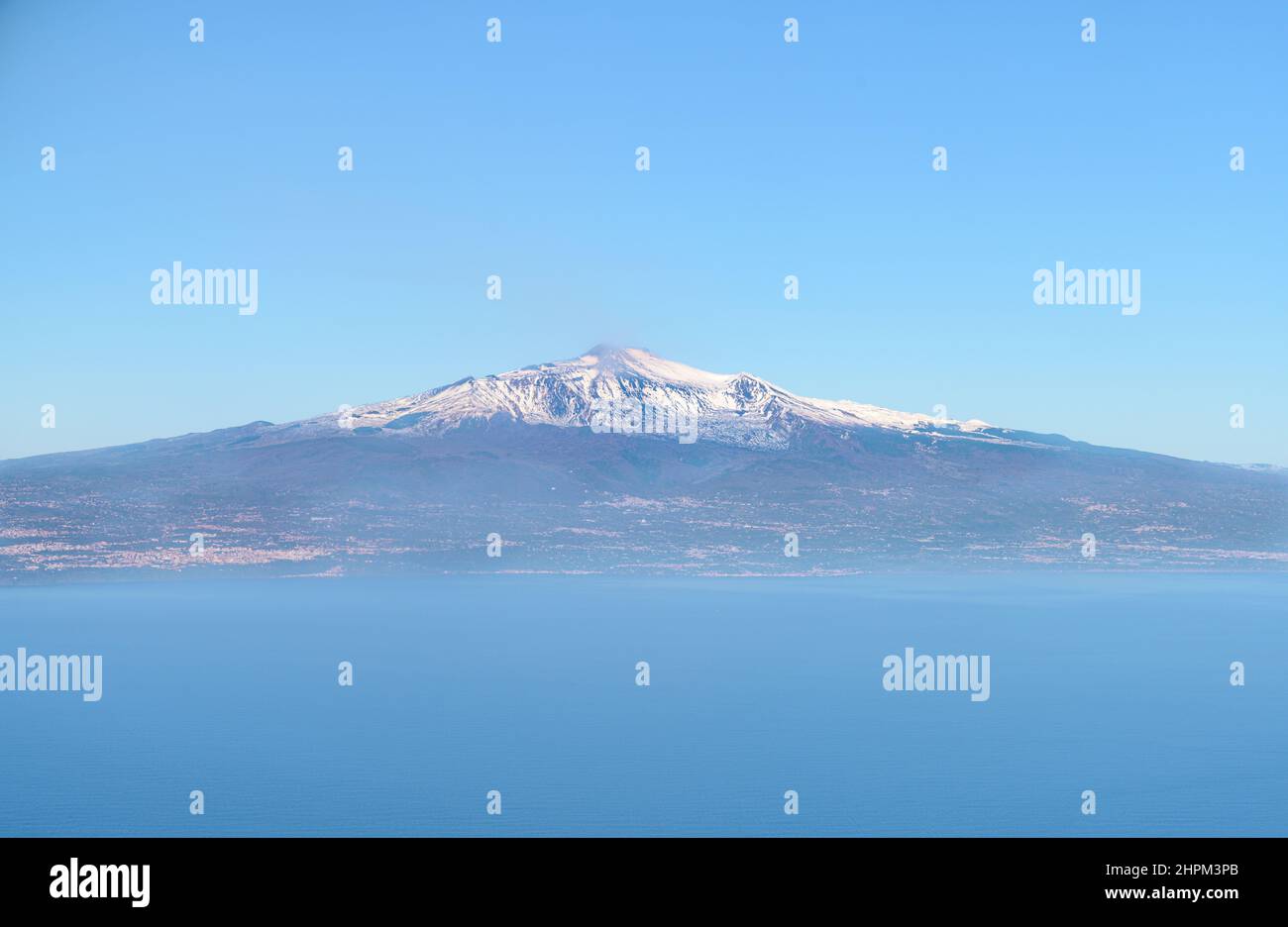 Aerial view of Mount Etna, an active volcano in Sicily, with snow ...