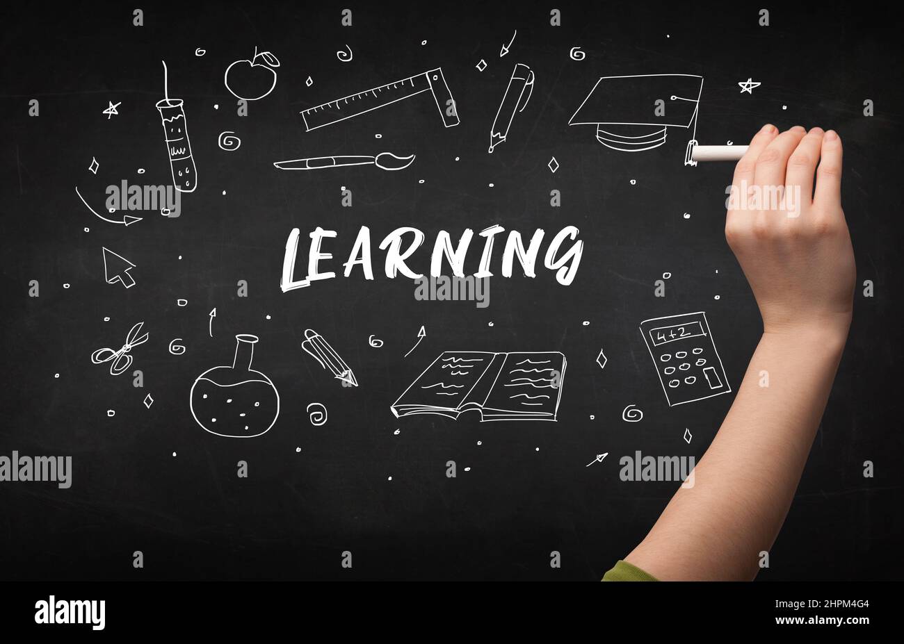 Hand drawing education concept Stock Photo - Alamy