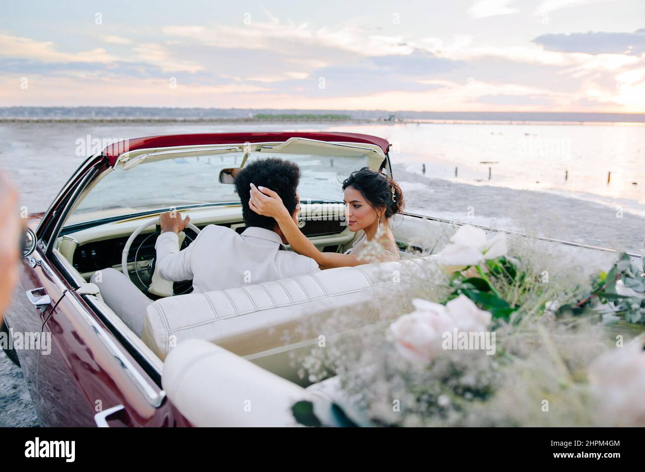 Beautiful couple at sunset on a summer wedding day. Romantic couple in ...