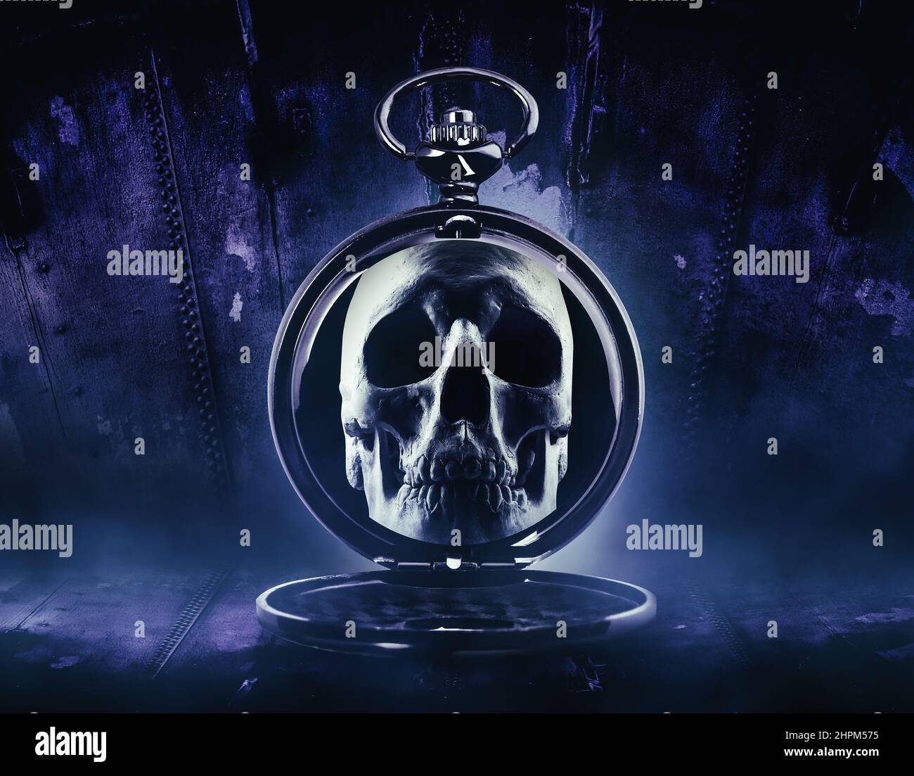 Horror scary photo of human skull in pocket watch on dark blue ...
