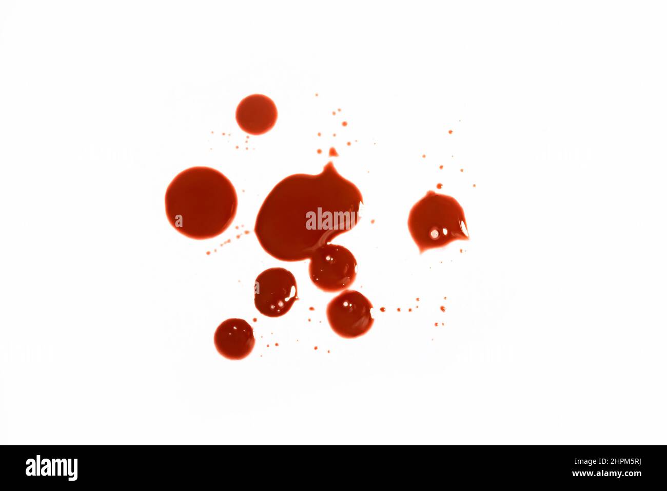 Photo of red bloody drops on white background Stock Photo - Alamy