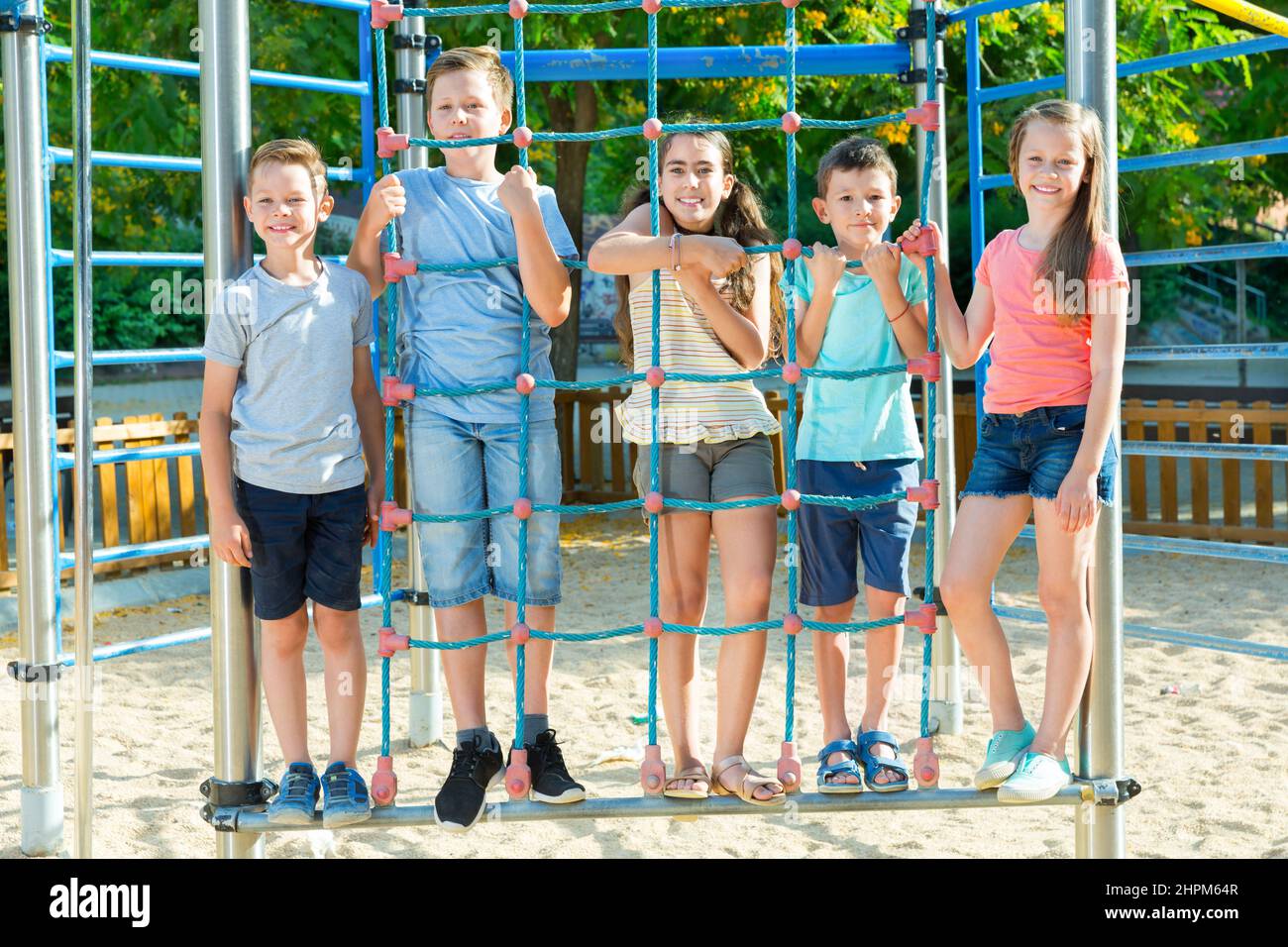 Happy children playing at playground Stock Photo - Alamy