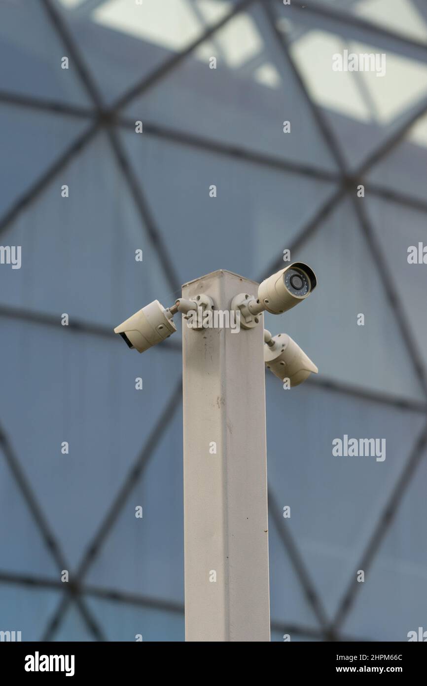 street security camera with 3 way directions Stock Photo - Alamy